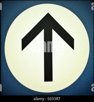 Arrow sign pointing upwards Stock Photo - Alamy
