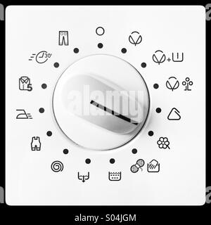 A washing machine control knob Stock Photo - Alamy