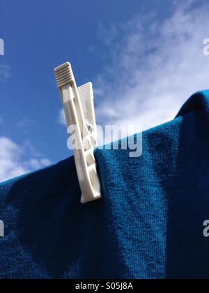 Peg on a clothing line close up Stock Photo - Alamy