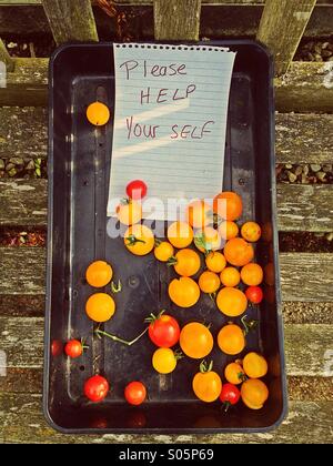 Please help yourself sign on tomatoes Stock Photo - Alamy