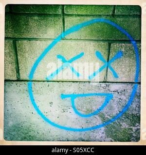 Smiley face graffiti Stock Photo - Alamy