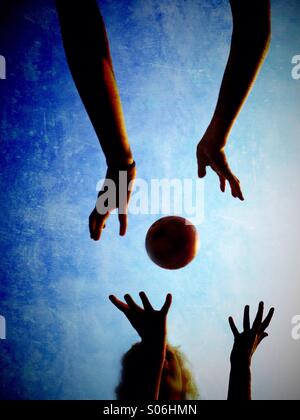Girls Playing Catch Stock Photo - Alamy