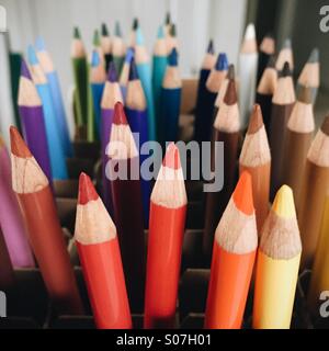 Close up of colored pencils for drawing on blurred background copy ...