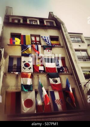 Flags of different countries on the building, horizontal format Stock ...