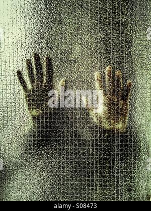 Man behind a glass Stock Photo - Alamy