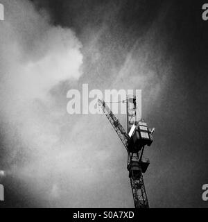 A construction Crain and clouds. London, England UK Stock Photo - Alamy