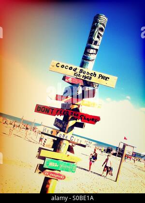 Cocoa Beach Pier Signpost, Florida, USA Stock Photo - Alamy