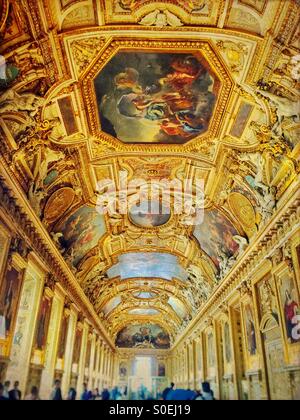 Galerie d’ Apollon, high vaulted ceilings with painted decorations ...