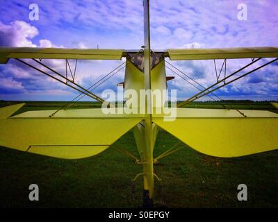 Easy Raider microlight aircraft on the grass under blue sky at North ...