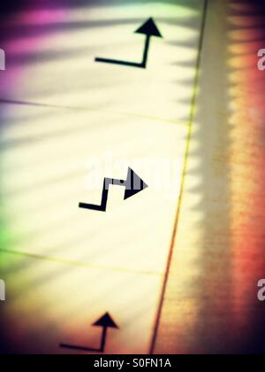 Directional arrows on hall sign Stock Photo - Alamy