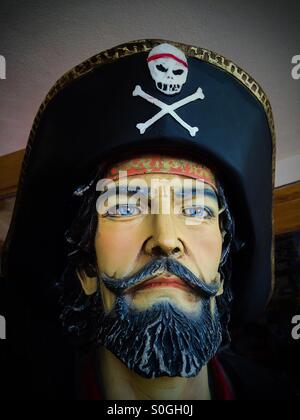 Pirate statue with skull and crossbones hat with eyepatch, France Stock ...