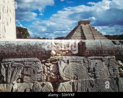 Mayan inscriptions with main Chichen Itza pyramid in background Mexico ...