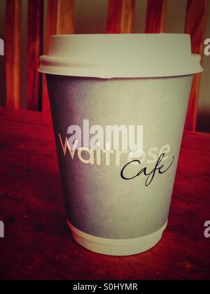 A cup of free coffee at a Waitrose supermarket. UK. This cup is a ...