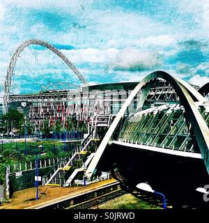 The White Horse Bridge across Wembley Stadium railway station showing ...