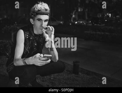 Young punk rocker smoking cigarette Stock Photo: 30507799 - Alamy