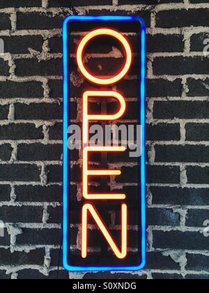 Neon shop open store sign at night in street photograph Stock Photo - Alamy