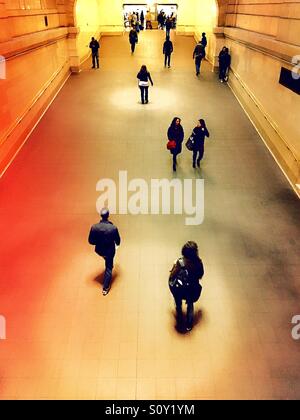 Travelers move up a ramp in Grand Central terminal, New York City, USA ...
