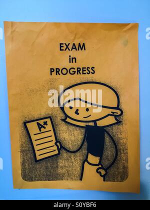 Quiet please exam in progress, handwritten poster banner on white ...