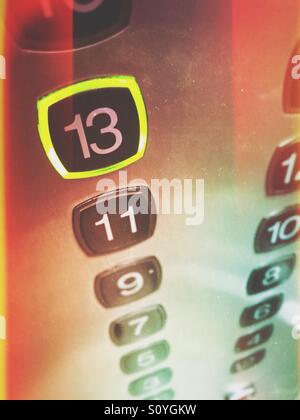 13th floor button pushed in an elevator Stock Photo - Alamy
