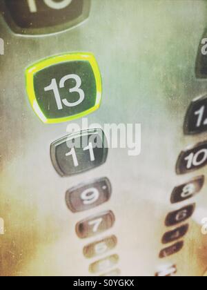 13th floor button pushed in an elevator Stock Photo - Alamy