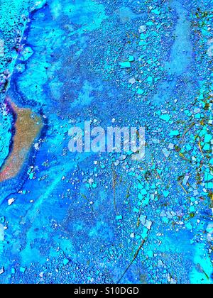 Blue paint spilled and dried on pavement Stock Photo - Alamy
