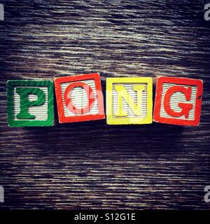 PING word written with wood block letter toys Stock Photo - Alamy