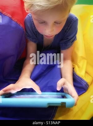 Girl Laying on Stomach Stock Photo - Alamy