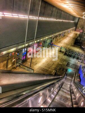 Looking down escalators Stock Photo - Alamy