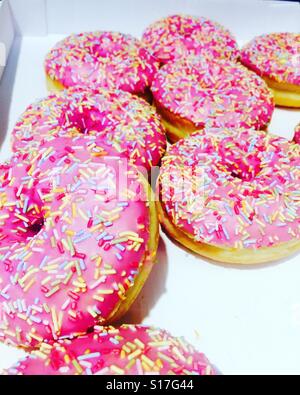 Donut with pink frosting and sprinkles Stock Photo: 2083625 - Alamy