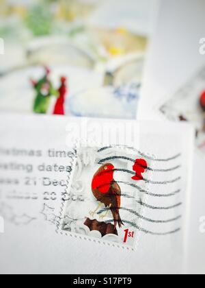 Festive Royal Mail christmas 1st class postage stamps Stock Photo - Alamy