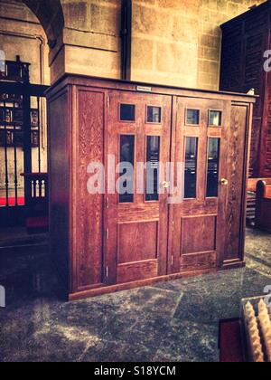 Wooden confessional, stall in which the priest hear the confessions of ...
