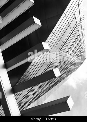 Tall building with repetitive windows Stock Photo - Alamy