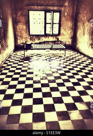 Torture bed in prison cell Stock Photo - Alamy