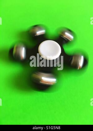 Fidget spinner, spinning Stock Photo - Alamy
