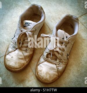 Old trainers. Worn out shoes Stock Photo - Alamy
