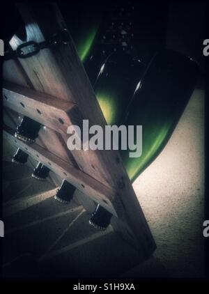 The process of riddling homemade sparkling wine using a traditional ...