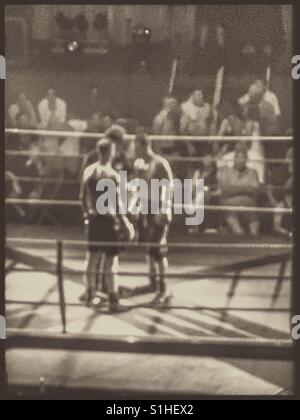 Boxers facing off boxing ring Stock Photo - Alamy