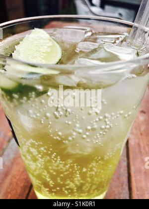 A pint glass of Lime and Soda water Stock Photo - Alamy