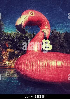 Plastic toys at the swimming pool on vacation Stock Photo - Alamy