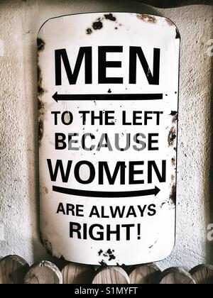 men to the left because women are always right sign Stock Photo - Alamy