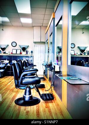 Barbers shop with empty chairs Stock Photo - Alamy