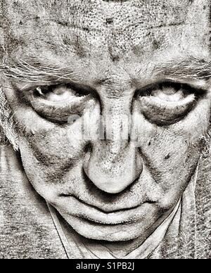 An intense stare from a man with their face painted with the Syrian ...