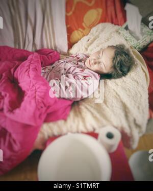 Sick girl with bucket Stock Photo - Alamy