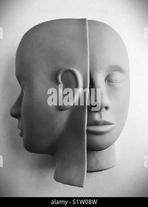 two faces opposite to each other Stock Photo - Alamy