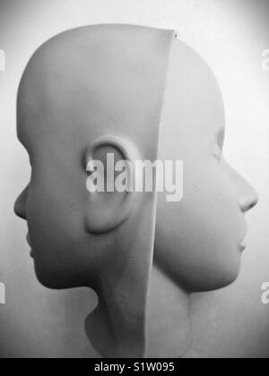 two faces opposite to each other Stock Photo - Alamy
