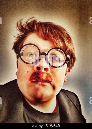 Ginger haired boy with ginger comedy moustache and comedy glasses Stock ...