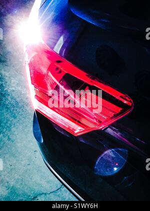 Detail on rear light blue car beige Stock Photo - Alamy