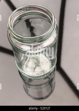 Reflections of a glass jam jar Stock Photo - Alamy