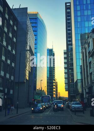 Aldgate street scene reflection Stock Photo - Alamy
