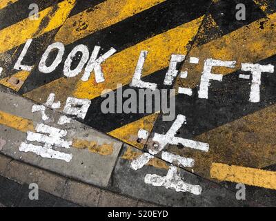 Pedestrian signs - look left Traffic warning near Edinburgh, Scotland ...